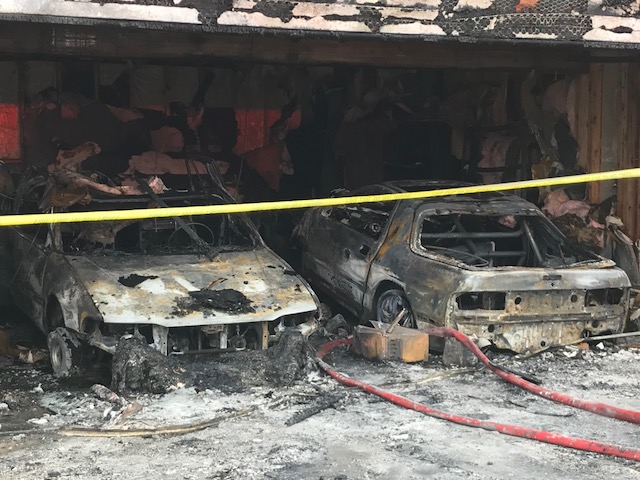 Garage destroyed; Firefighters keep flames from house