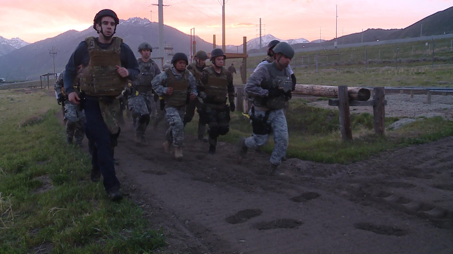 Officers climb, crawl and jump while training for SWAT