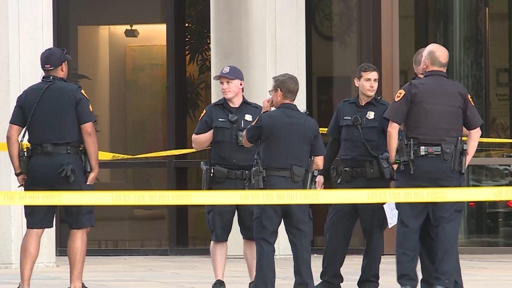 Security guard arrested after police say he shot man in the back ...