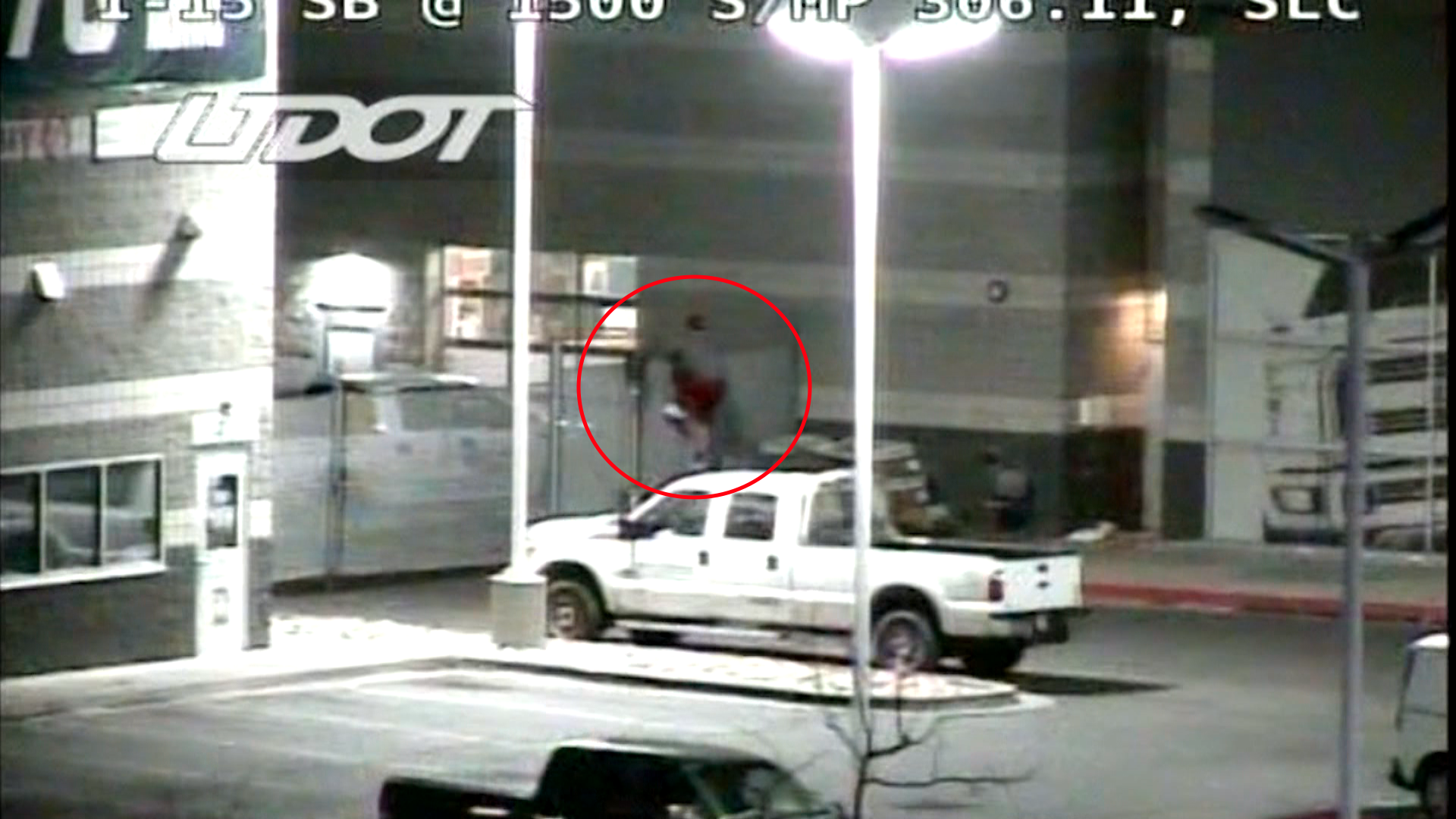 Traffic Camera Captures Suspect Apparently Trying To Hide After Police ...