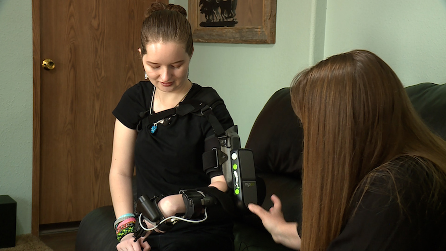 Utah teen who survived gunshot to the head gets new robotic arm