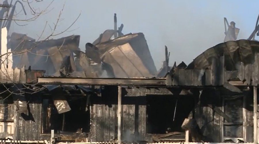 Guests seen jumping from balconies of burning hotel, fire marshal says ...