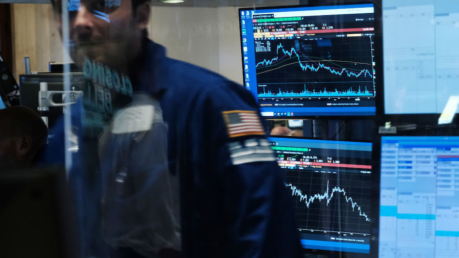 Dow drops 1,008 after Fed's Powell says rates will stay high