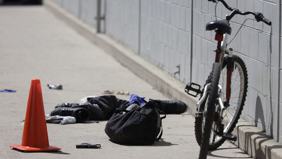 Shooting suspect hospitalized after being shot by officer, police say ...
