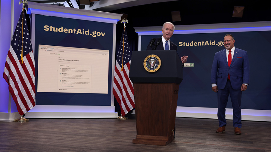 Student debt relief can move 'full speed ahead' despite temporary hold ...