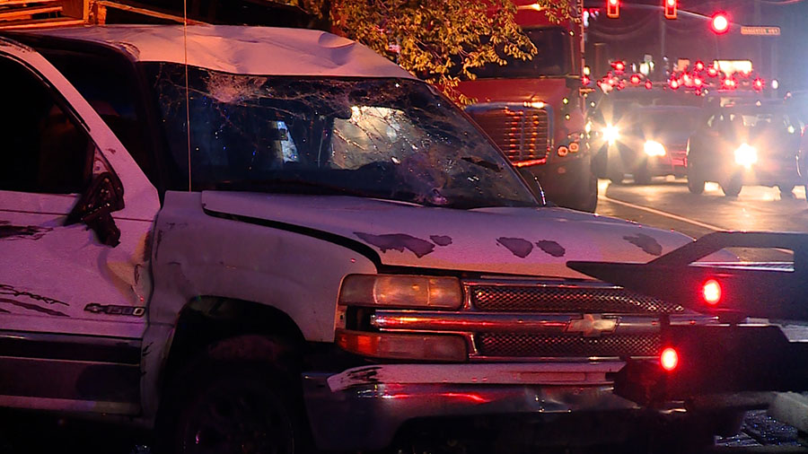 Distracted driver runs red light, T-bones car and rolls over, police ...