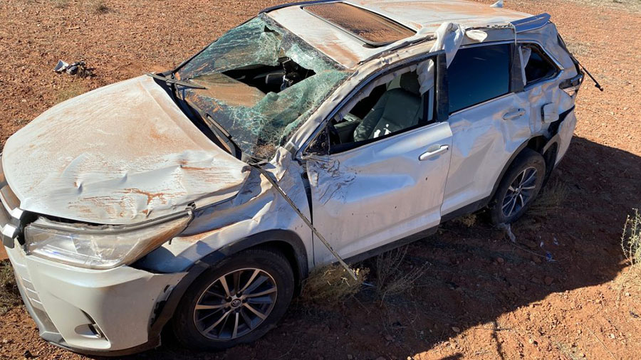 Sideswiping between 2 cars causes rollover