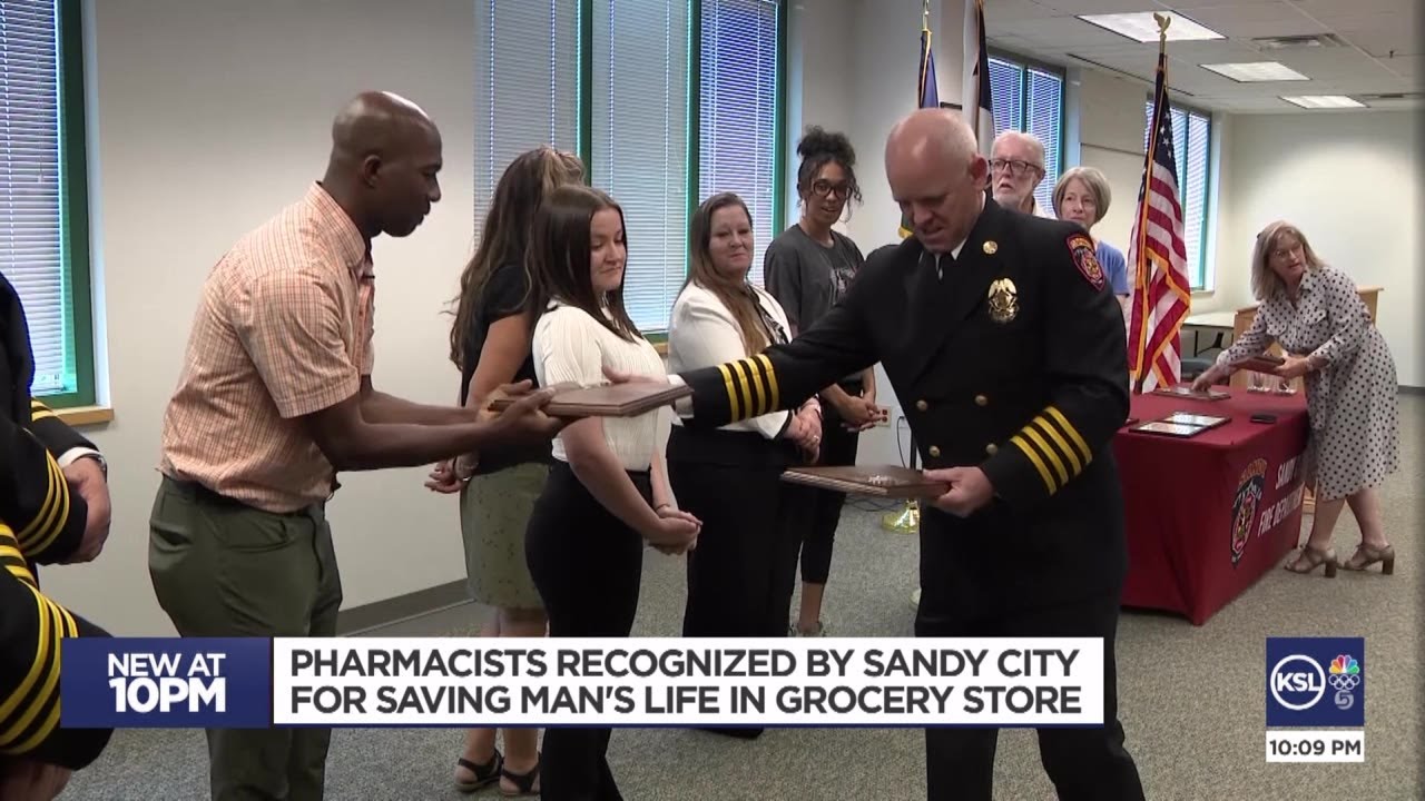Video: Smith's workers recognized by Sandy City for helping to save a life - KSLTV.com