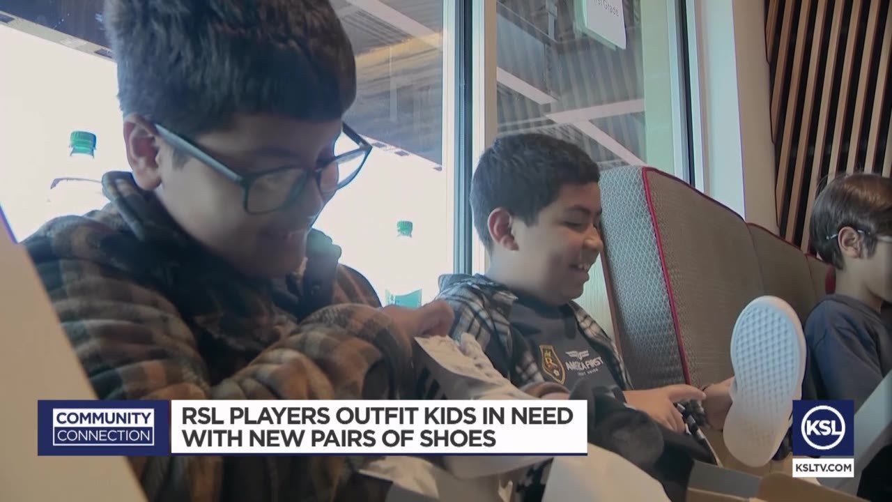 Video: RSL players help give out new shoes and socks to students in ...