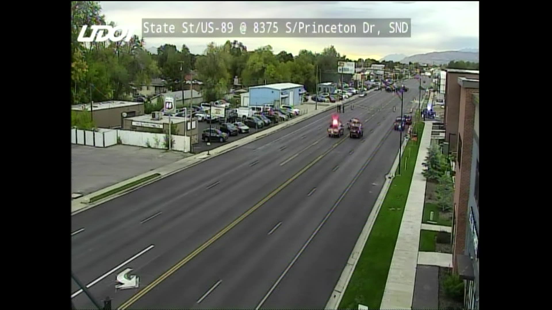 Both directions of State Street shut down after shooting between cars ...