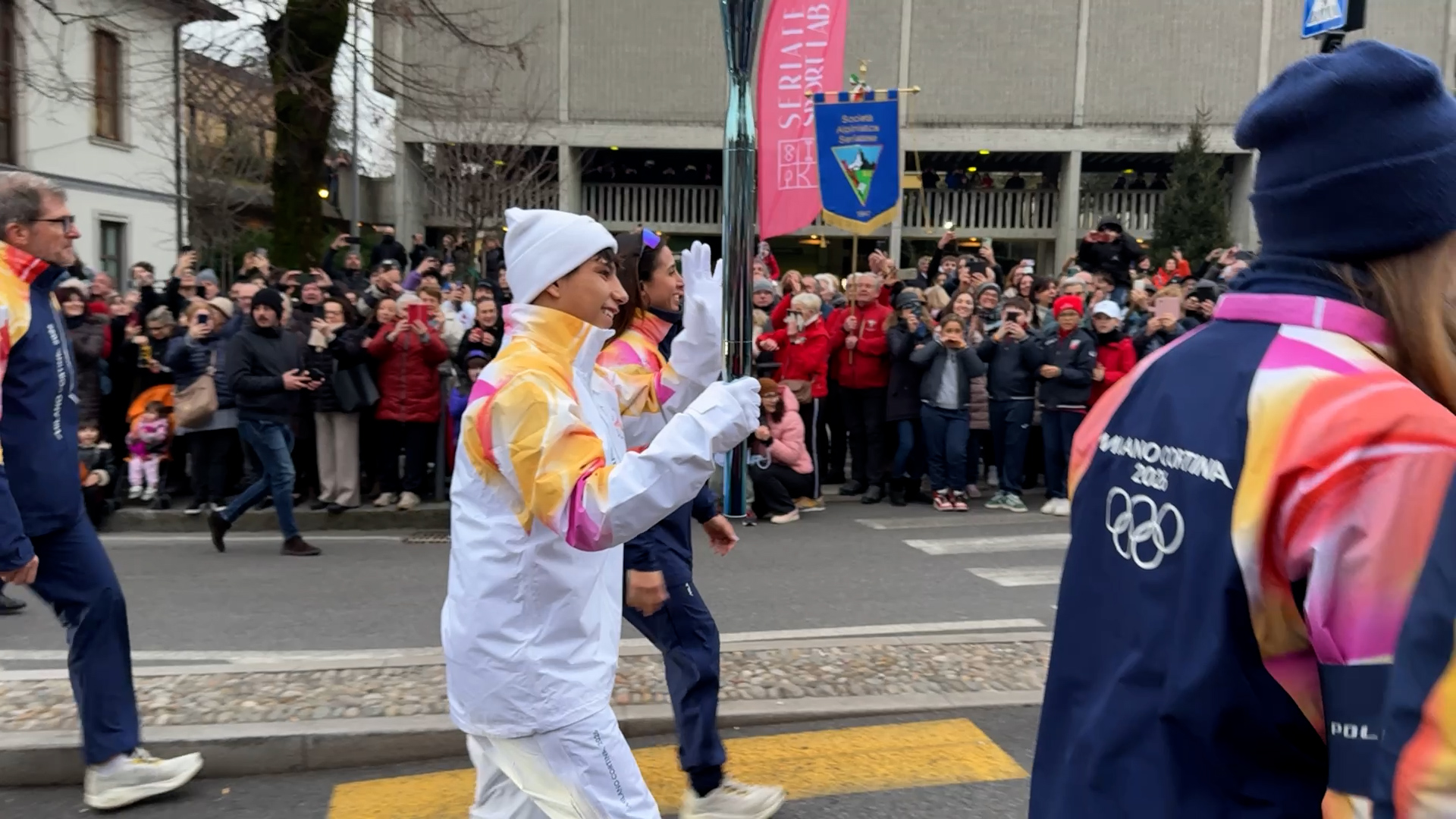 Olympic torch lights up Bergamo for Colorado athlete with Utah ...